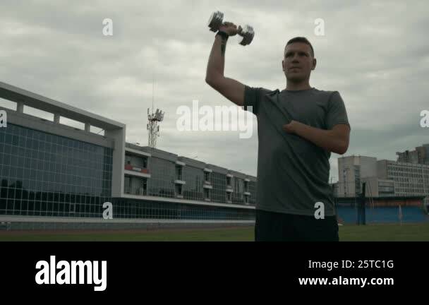 Medium shot of young Caucasian student sportsman with congenital ...