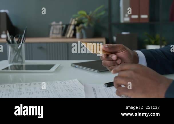 Close-up view of hands of unrecognizable financial advisor giving ...