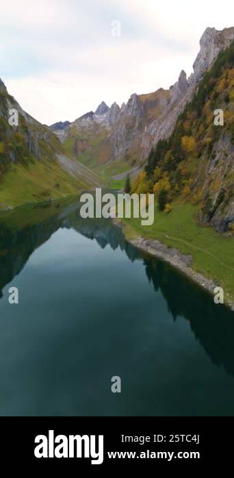Experience the breathtaking beauty of Falensee, Switzerland, as autumn ...