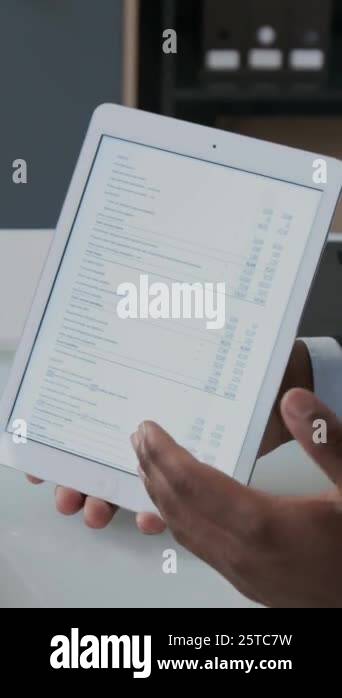 Vertical close up shot of hands of unrecognizable financial advisor ...