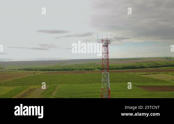 Tower transmits radio broadcasts over vast countryside area. Construction put in field allows ...