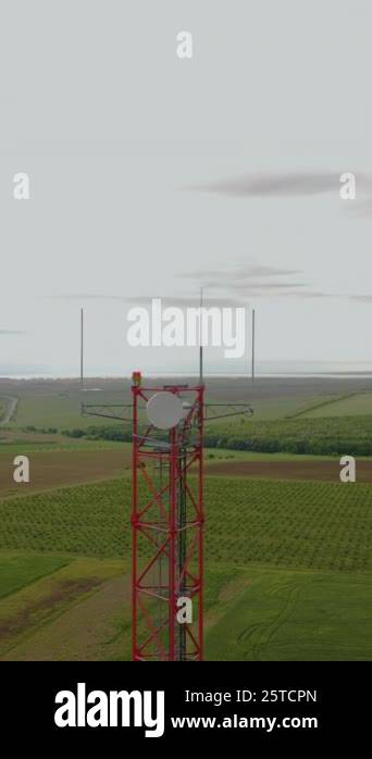 TV tower top with antennas sends out radio waves carrying signals. Construction provides stable ...