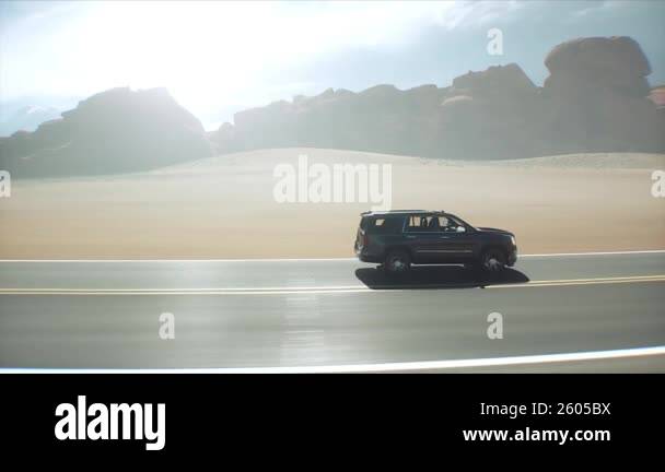 3d model luxury black car on desert highway. Very fast driving ...