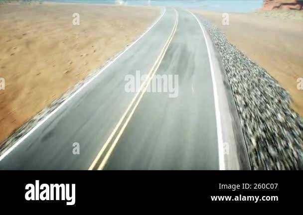 camera flight over desert highway. Realistic 4k animation Stock Video ...