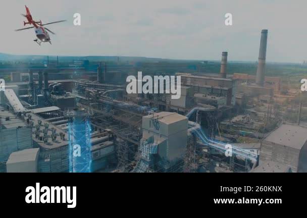 A helicopter circling the industrial area. A helicopter flying over a ...