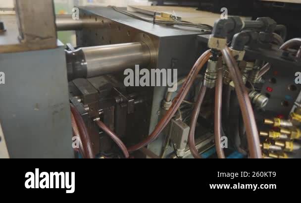 Injection molding thermoplastic machine. The process of creating a plastic part by injection ...