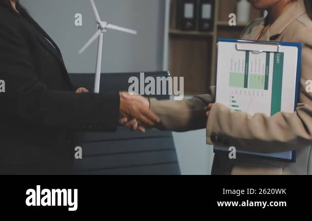 businessman giving handshake to colleagues in office Stock Video Footage - Alamy