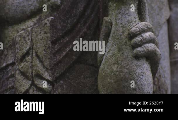 A buddhism stone statue at Japanese temple. High quality 4k footage ...