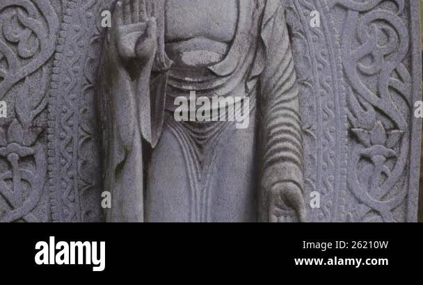 A buddhism stone statue at Japanese temple. High quality 4k footage ...