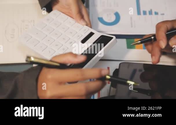 businessman writing on a calculator with a calculator Stock Video ...