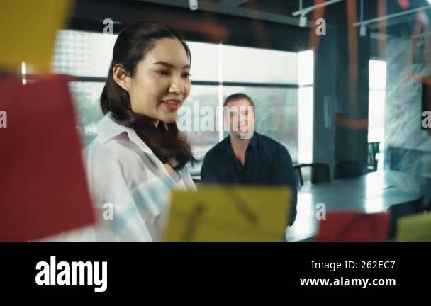 Young confident businesswoman present project to expert investor ...