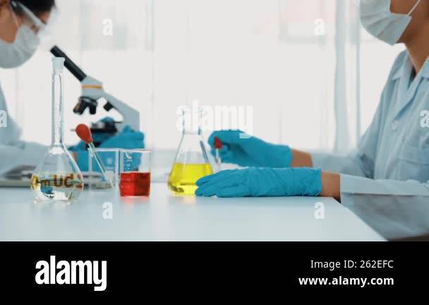 Laboratory researcher develop new medicine or cure using chemistry ...