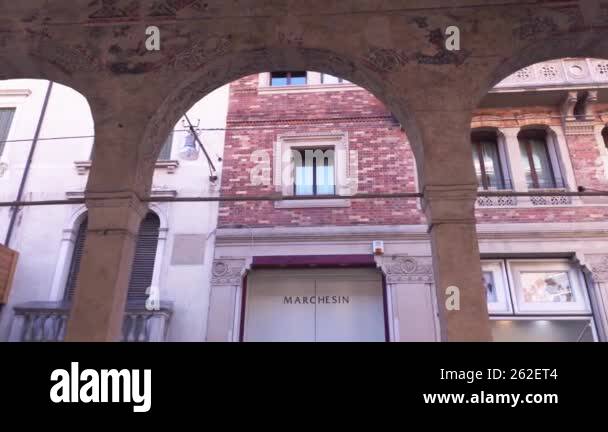 Treviso, Italy 1 January 2025: Viewing historic archways framing brick ...