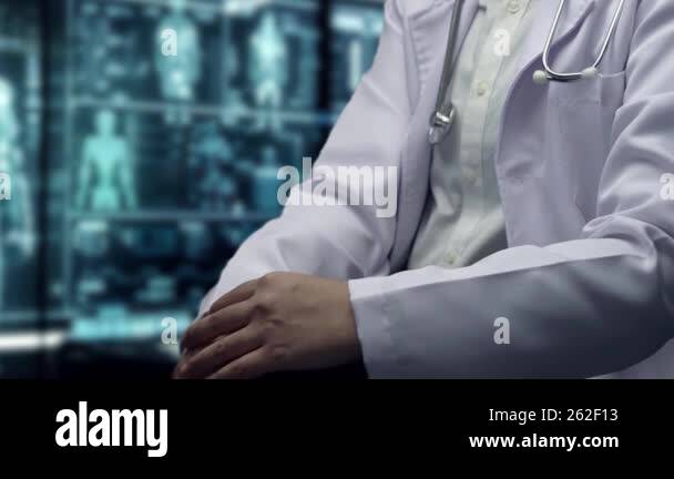 Close up of professional doctor sitting and showing DNA sample hologram ...