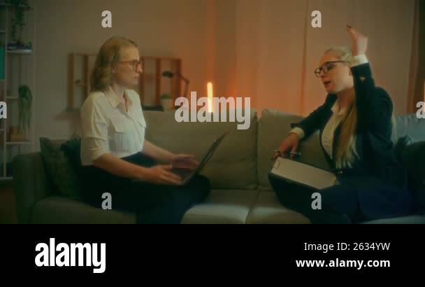 A business coach provides her client with business consultation and ...