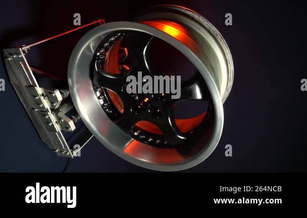 old car wheels titanium rims long exposure video on dark background ...