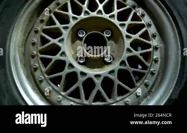 old car wheels titanium rims long exposure video on dark background ...