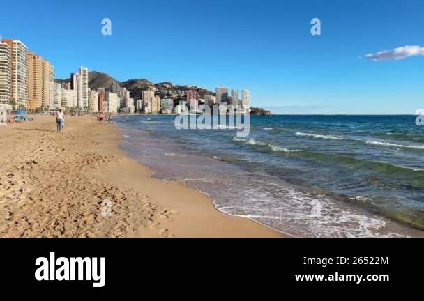 Benidorm, Spain; January 11, 2025: Relax on the golden sands of Levante ...