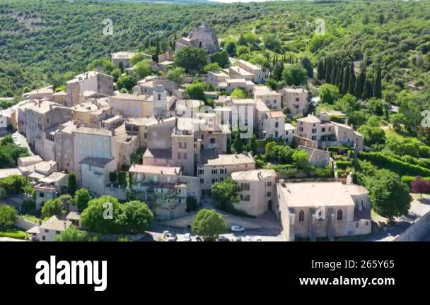 View of Simiane la Rotonde village in Provence, France. Simiane la ...