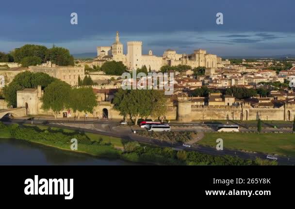 View of Avignon with Palais des Papes during sunset in Southern France ...