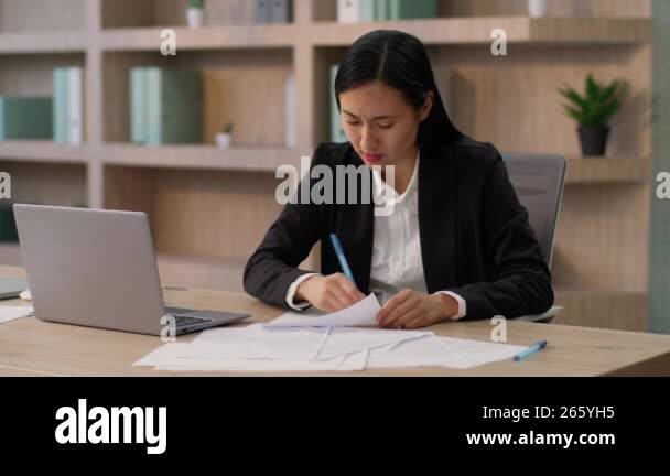 Nervous frustrated Asian Japanese Chinese business woman ethnic female ...