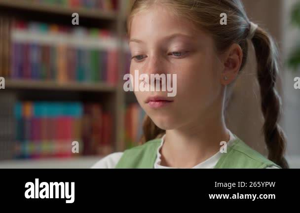 Sad little Caucasian teenager junior teen school girl child unhappy ...