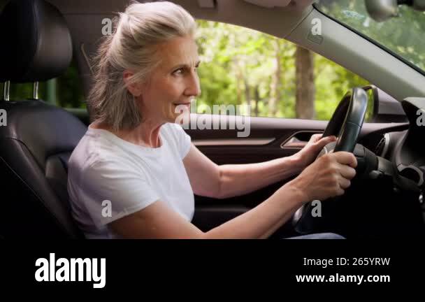 Curious Caucasian woman lady senior mature aged female rental service ...