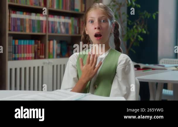 Shocked nervous Caucasian worried little girl school child kid pupil stressed student learner ...