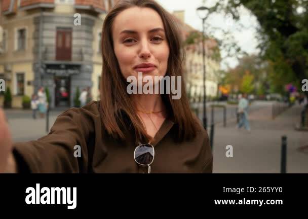 Webcam view selfie holding mobile phone record video recording blog ...