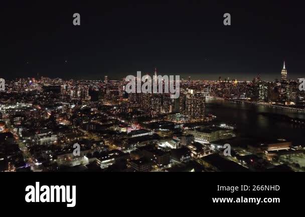 Captivating views of Queens at night, showcasing East River and ...