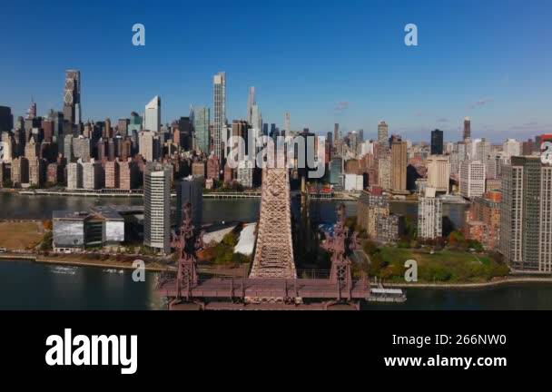 Camera movement glides forward above Queensboro Bridge, showcasing the ...