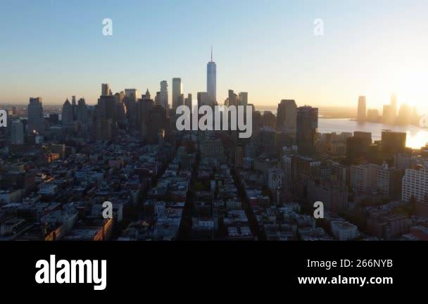 Aerial view of a sunrise over New York City skyline, highlighting One ...