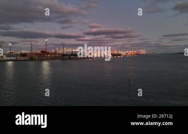 Cargo port at night. Container ships loading cargo at the Port of Miami ...