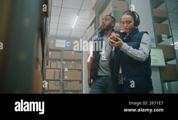 Diverse Sorting Center Employees in Warehouse Facility of E-Commerce ...