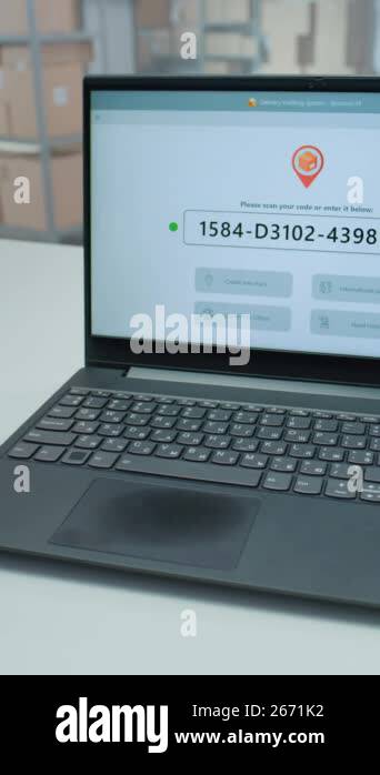 Close Up of Inventory Manager Scanning Code on Cardboard Box with ...