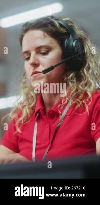 Female customer support specialist in logistics in headset talks to ...