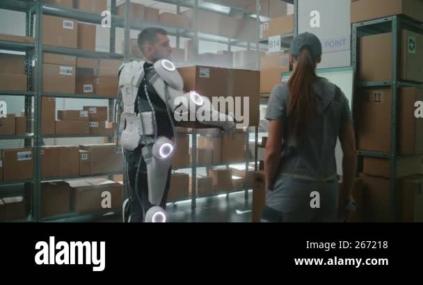 High-Tech Advanced Warehouse: Sorting Center Worker in Futuristic Full Body AI Powered ...