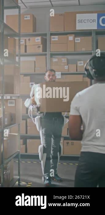 High-Tech Warehouse: African American Inventory Specialist with Tablet ...