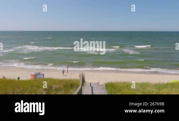 Landscape view of beach with waves in the sea at Curonian National Park ...