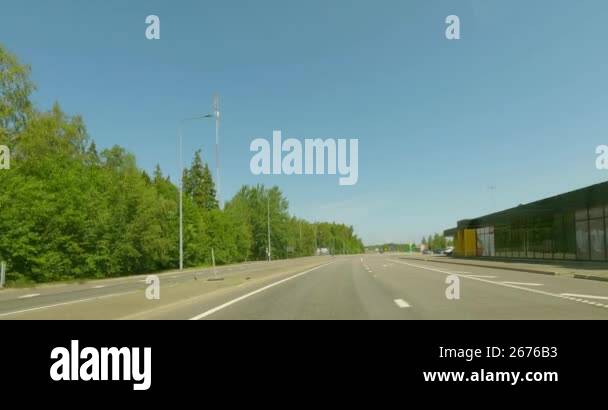 Road E67, Latvia July 9.2023 : POV view from car driving on the border ...