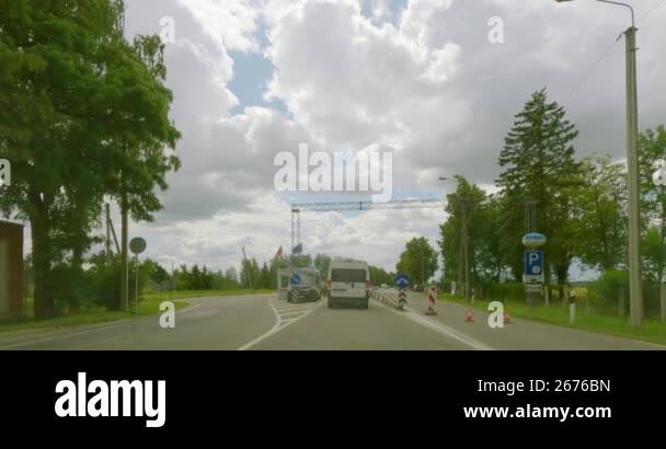 Road E77, Latvia July 9.2023 : POV view from car driving on the border ...