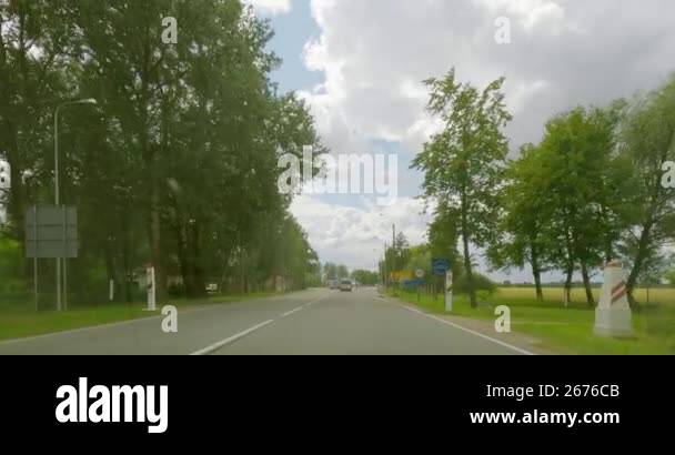 Road E77, Latvia July 9.2023 : POV view from car driving on the border ...