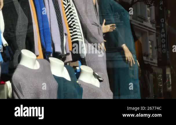 A variety of stylish clothing options beautifully showcased in a ...