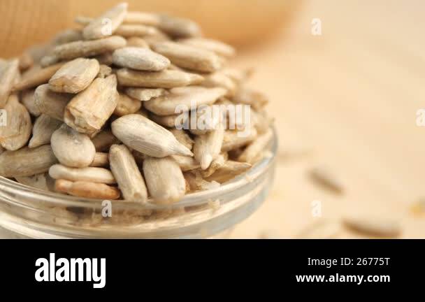 Closeup view of raw sunflower seeds, showcasing their unique texture ...