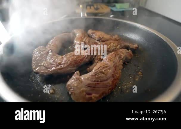 Cooking steak on pan, preparing protein rich food for mealtime Stock ...