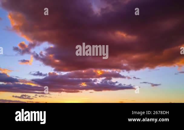 Beautiful sunset sky above clouds with dramatic light. Sunset with sun ...