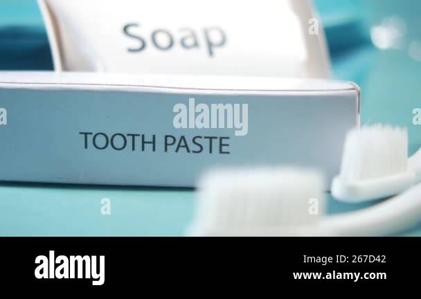 Toothpaste and soap in a hotel or travel kit Stock Video Footage - Alamy