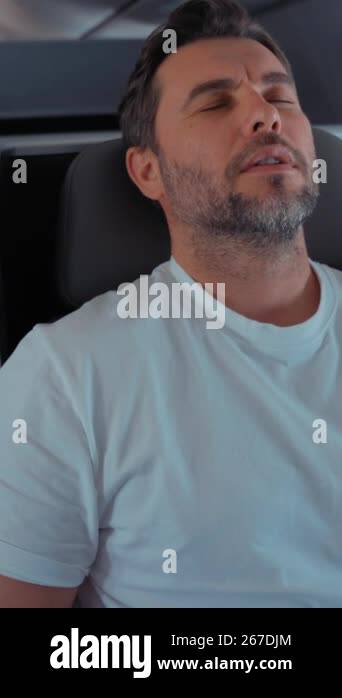 Scared Male Passenger Looking Out The Window Airplane. Man having a ...