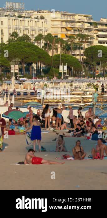 Cannes, France - October 15, 2024: People swimming and relaxing on the ...