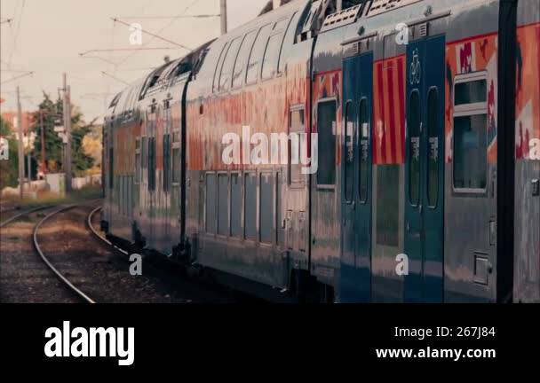 Close up of a train moving on the rails near a station in Nice, France ...
